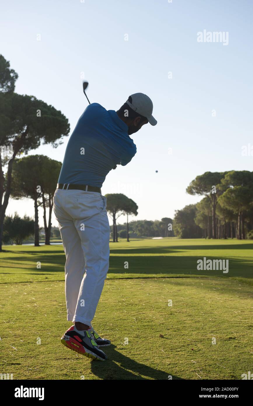 golf player hitting shot Stock Photo - Alamy