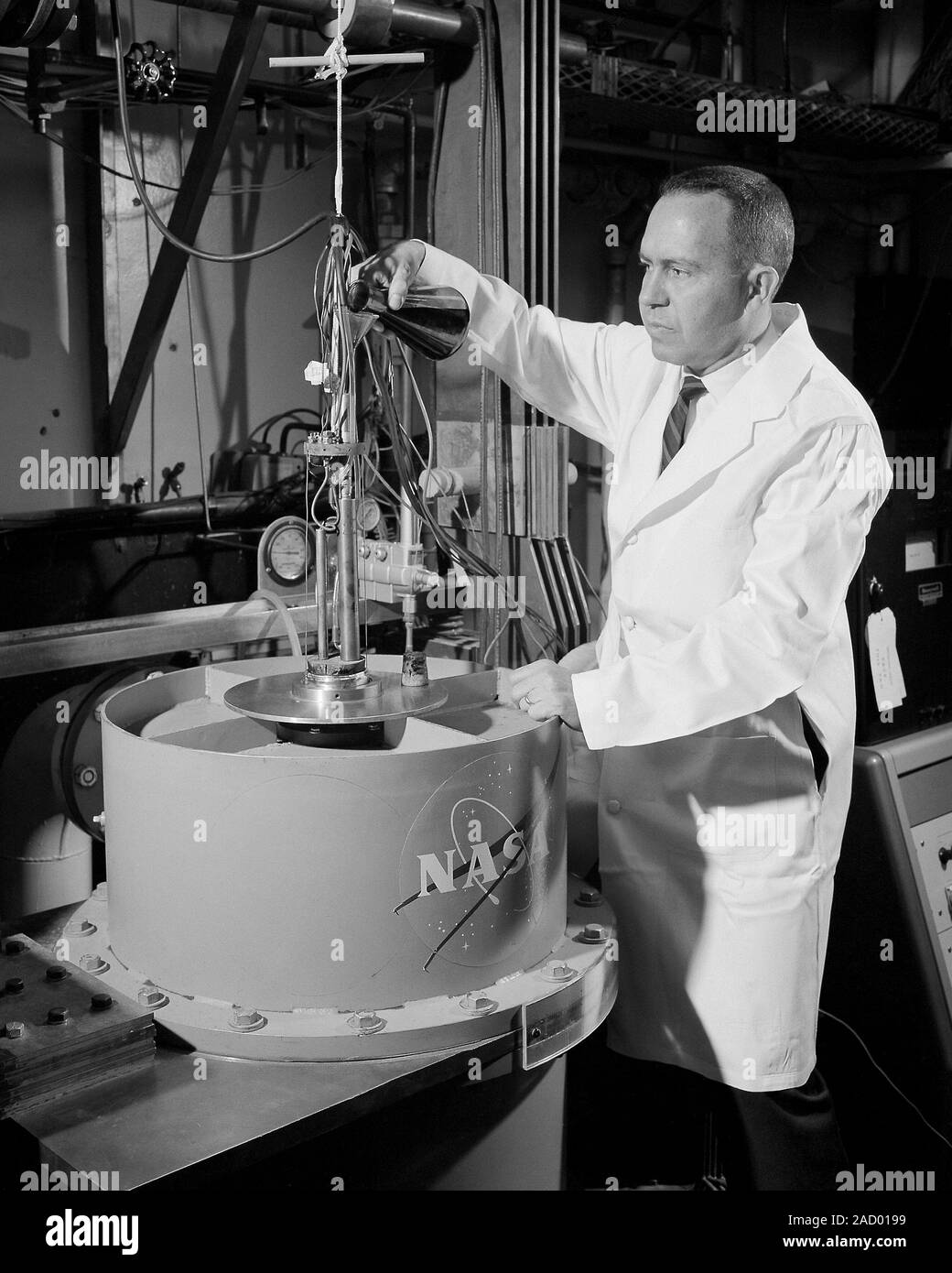 Steve Papell. Historical image of the US and NASA chemist experimenting ...