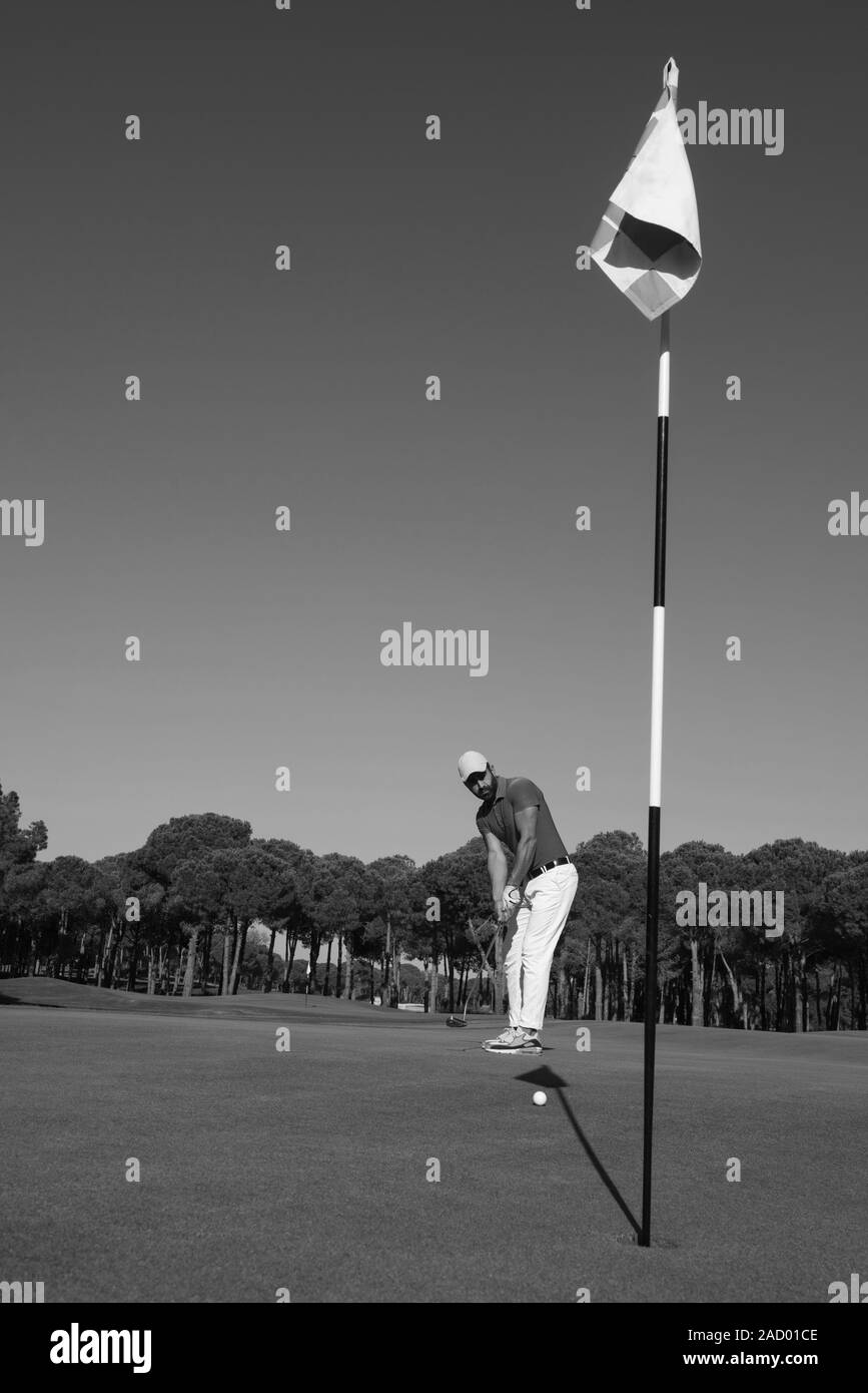 Man hitting golf ball Black and White Stock Photos & Images - Alamy