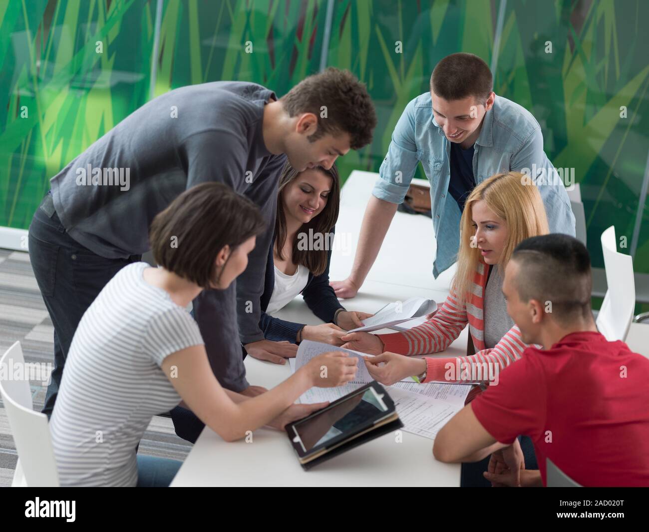 group of students study together in classroom Stock Photo - Alamy
