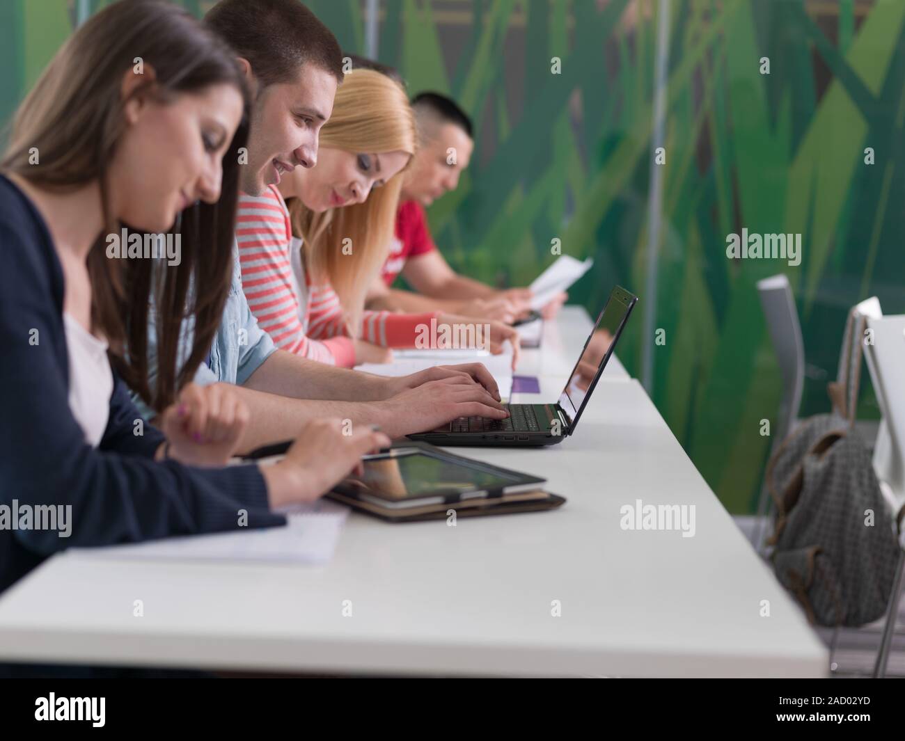 group of students study together in classroom Stock Photo - Alamy