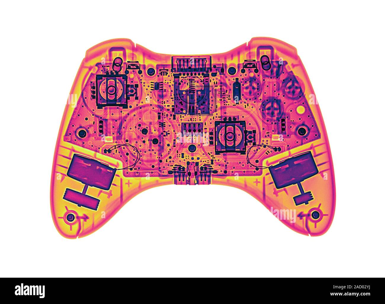 Coloured X-ray of a computer game controller Stock Photo - Alamy