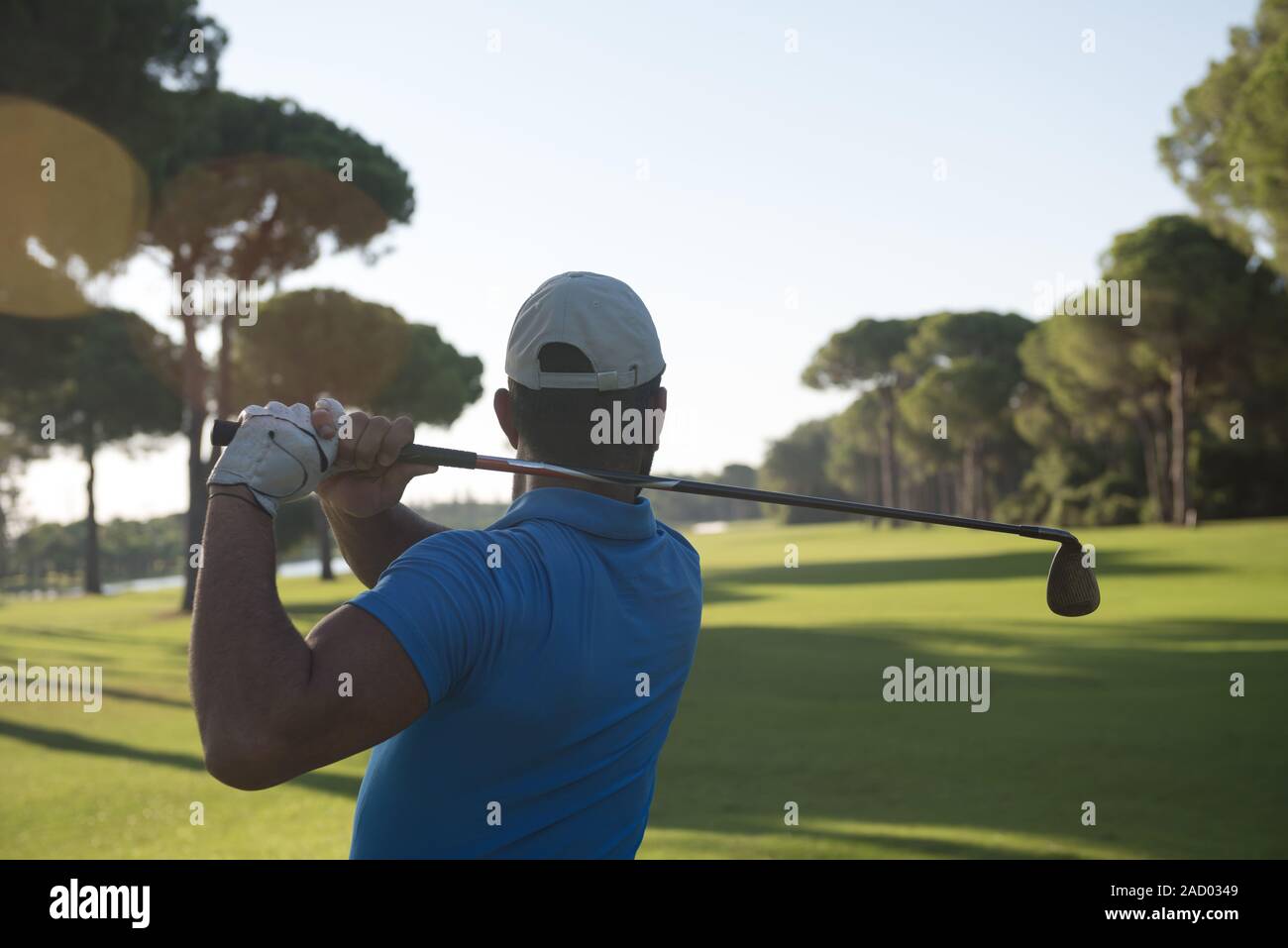 golf player hitting shot Stock Photo - Alamy