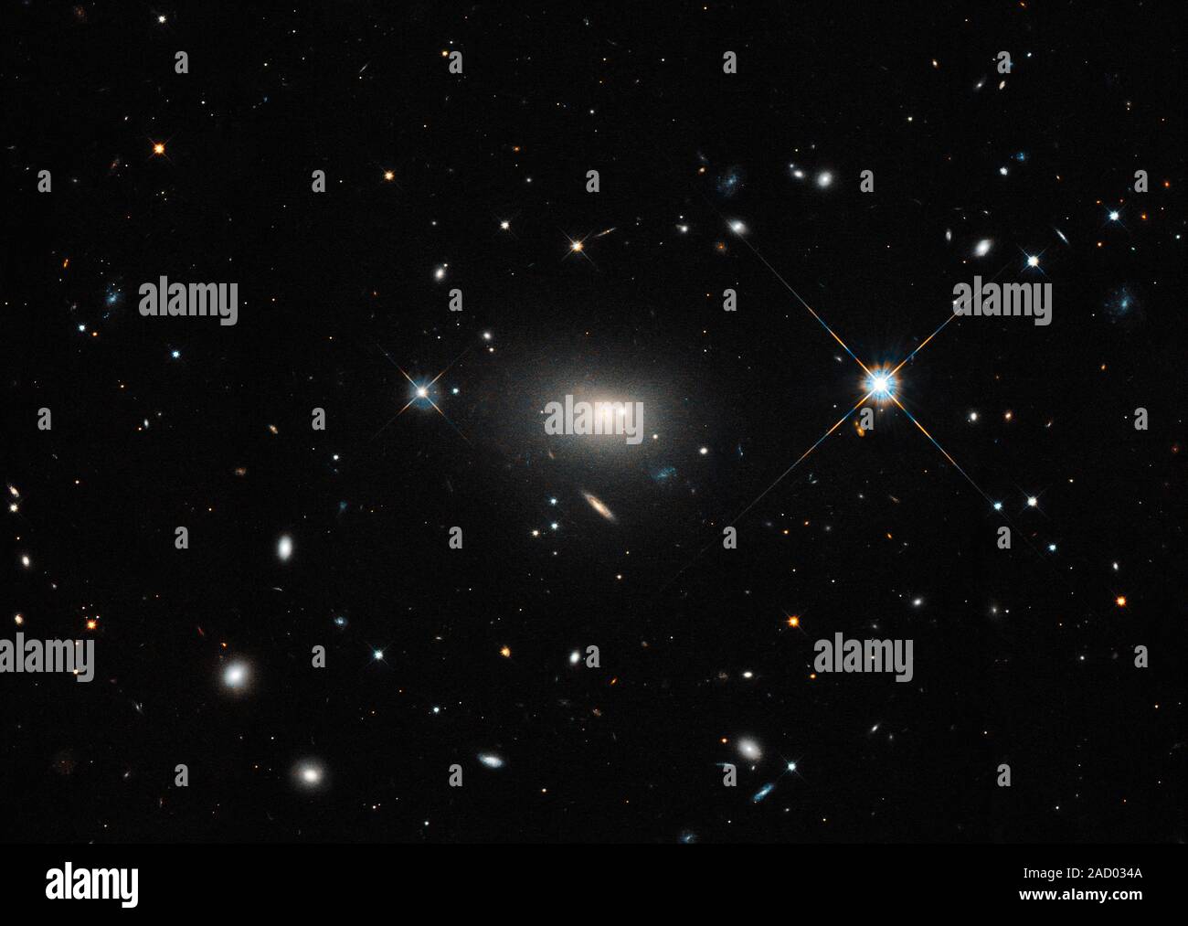 Hercules A galaxy. Hubble space telescope image of the active galaxy ...