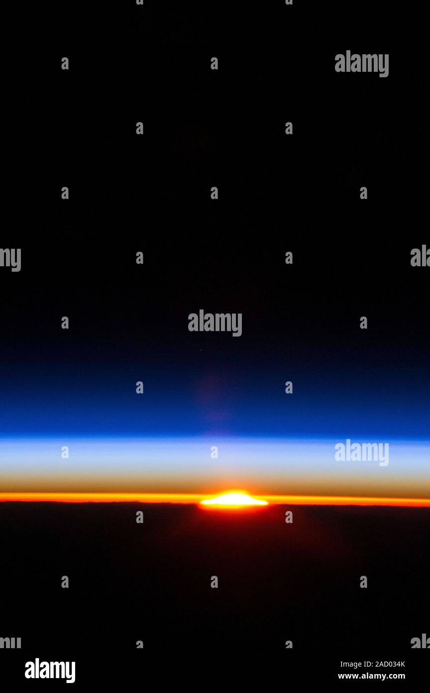 Sunlight distorted by Earth's atmosphere. Astronaut photograph showing ...