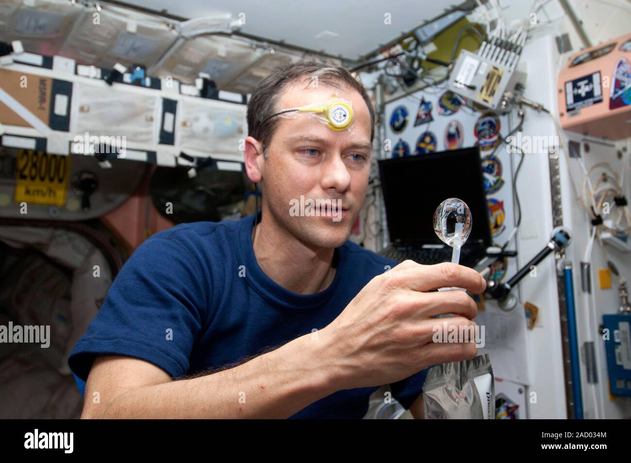 Astronaut on the ISS. NASA astronaut Tom Marshburn (born 1960 ...
