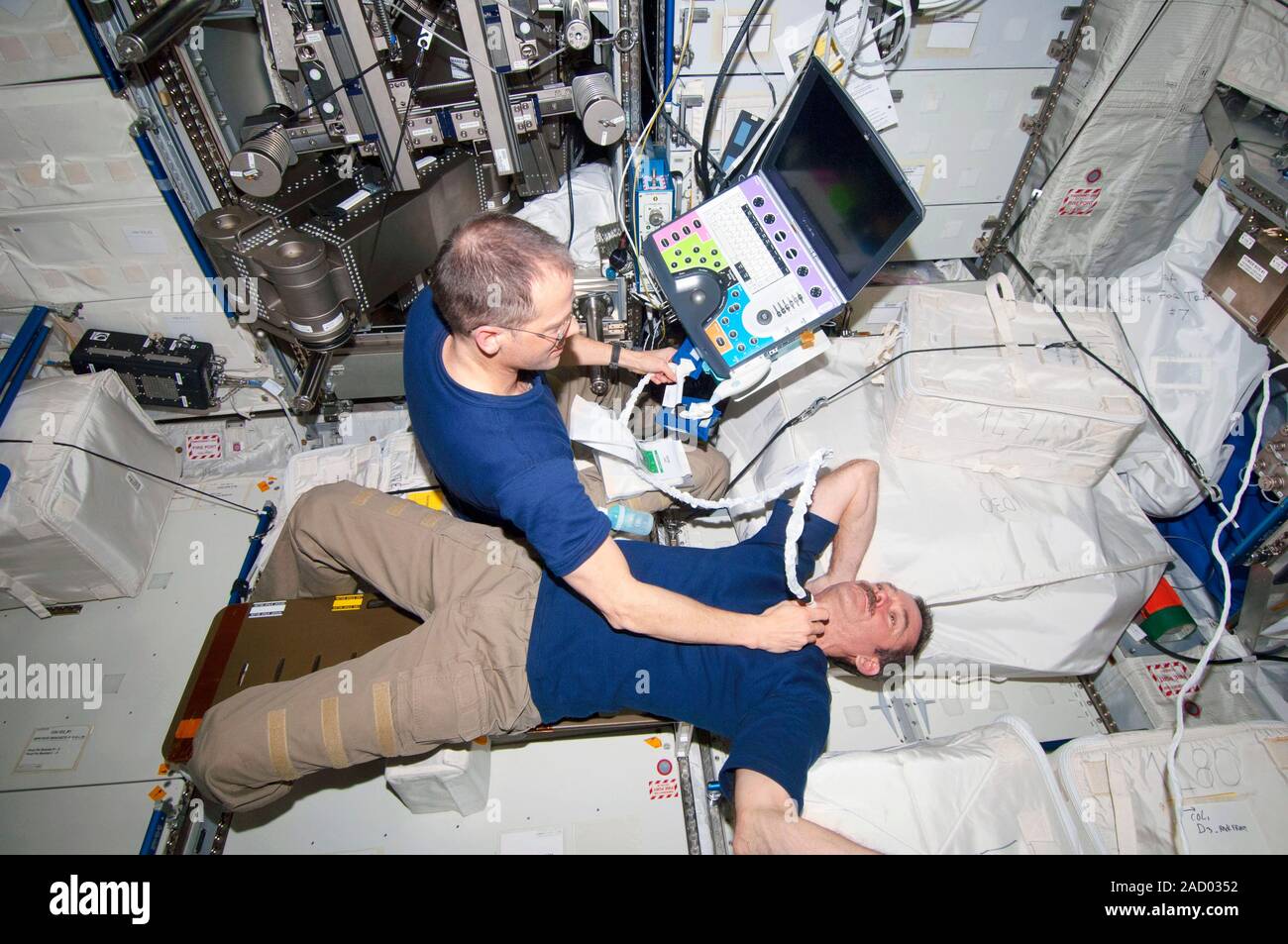 ISS astronaut ultrasound scan. NASA astronaut Tom Marshburn (born 1960 ...
