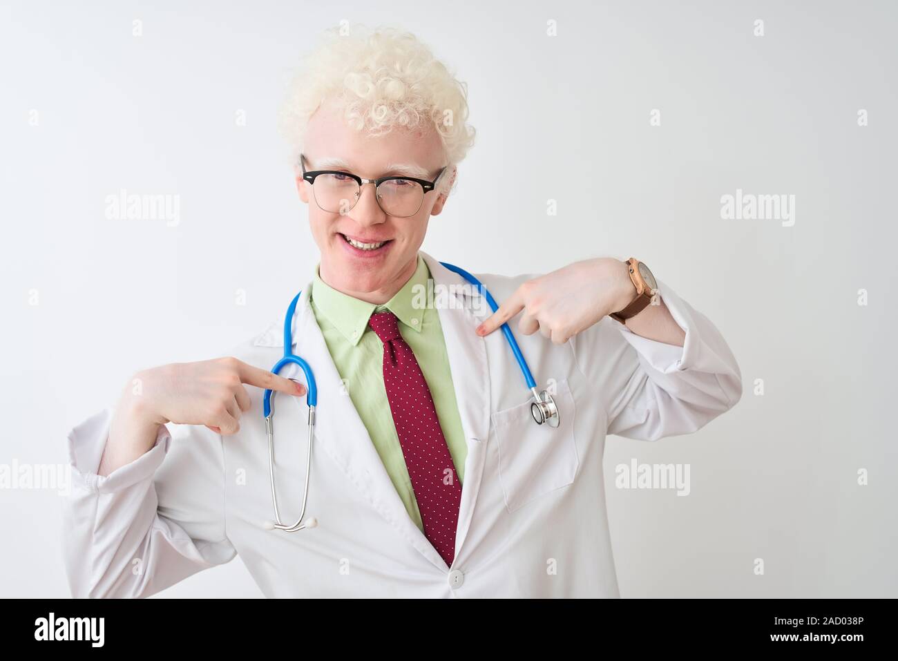 Young albino doctor man wearing stethoscope standing over isolated ...