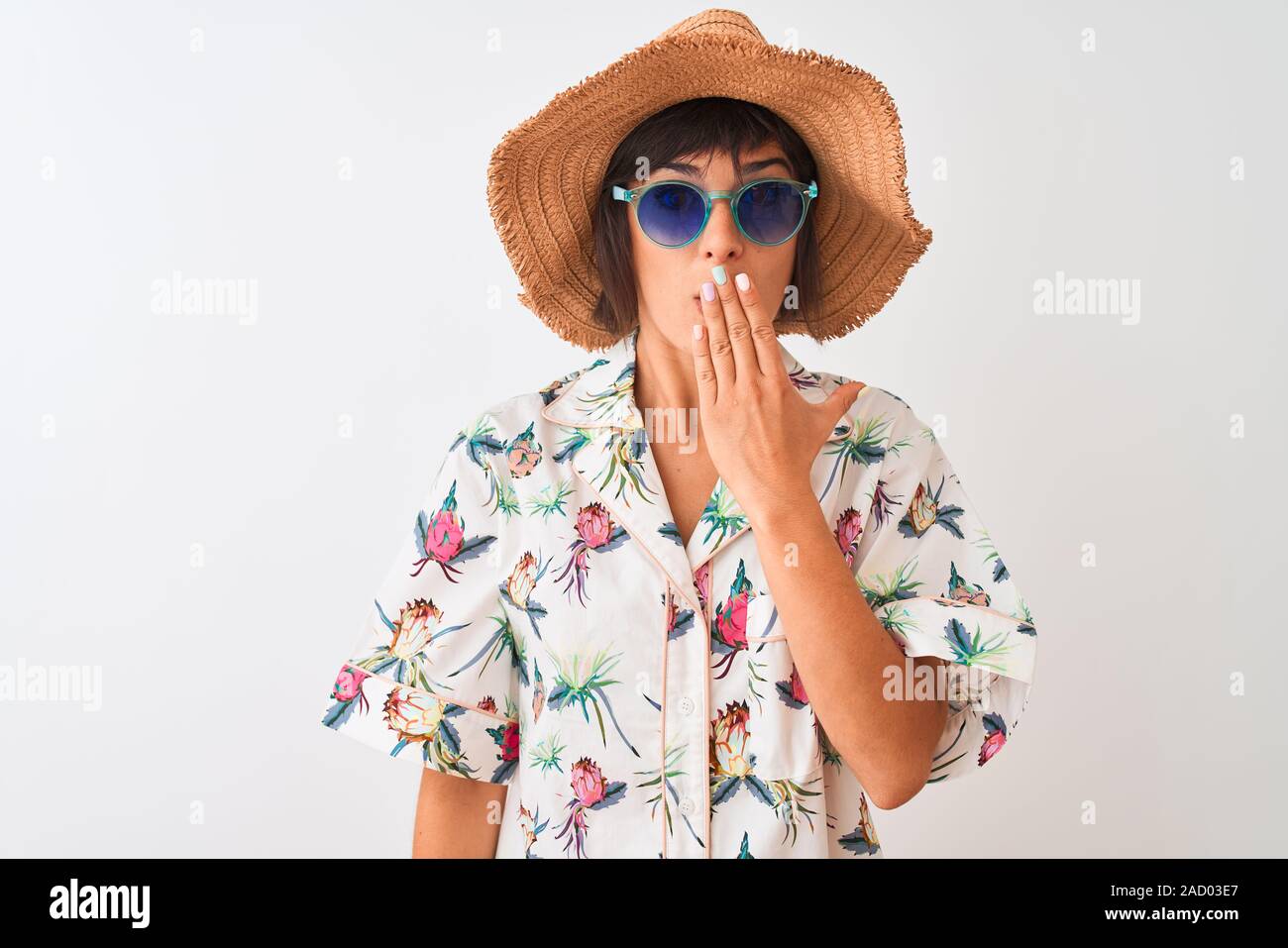 Woman on vacation wearing summer hat shirt and sunglasses over isolated ...