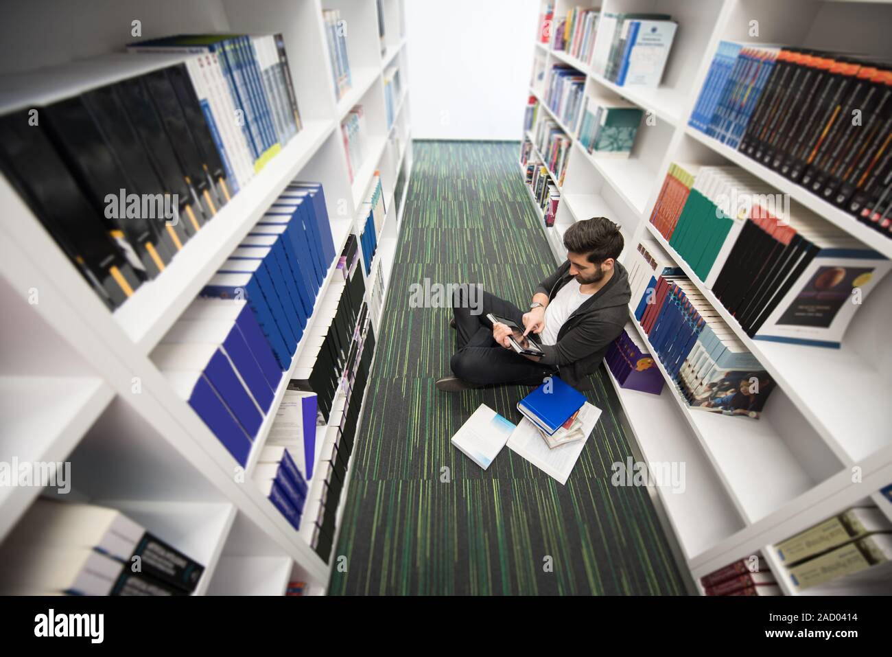 student study in school library Stock Photo - Alamy