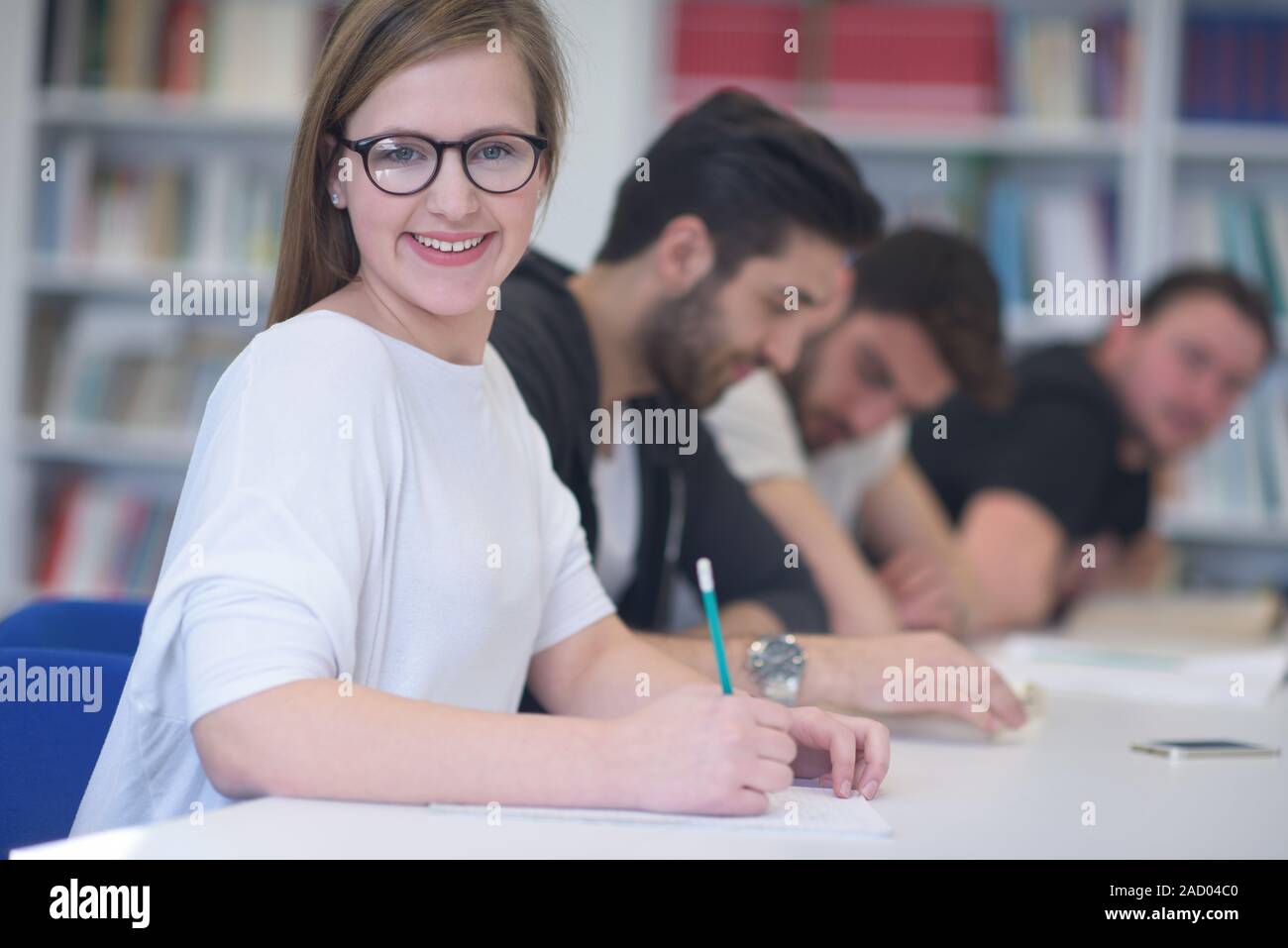group of students study together in classroom Stock Photo - Alamy