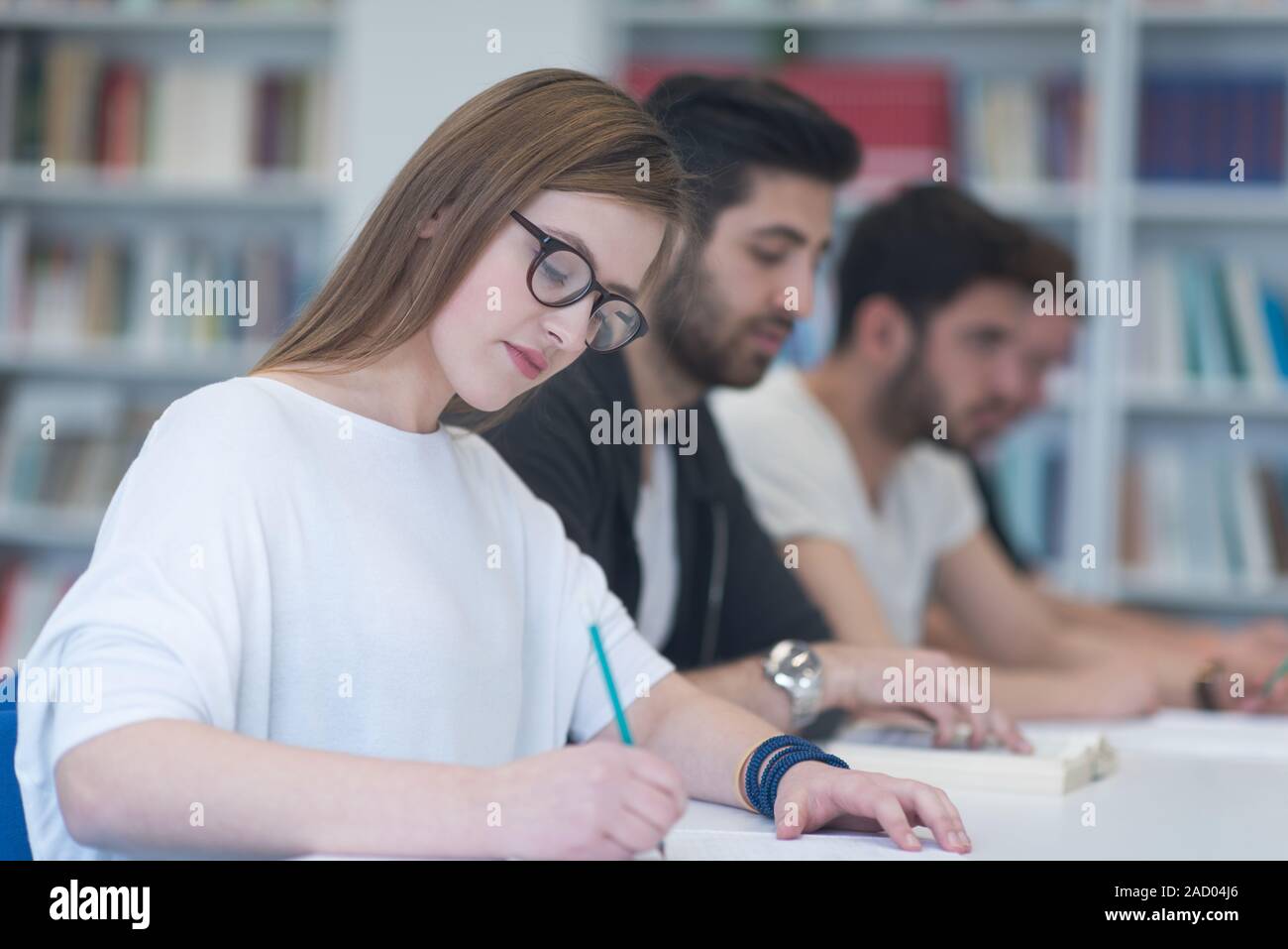 group of students study together in classroom Stock Photo - Alamy
