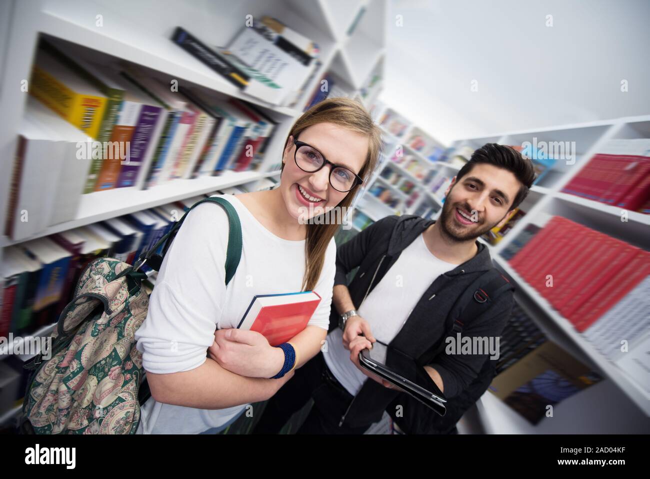 students group in school library Stock Photo - Alamy
