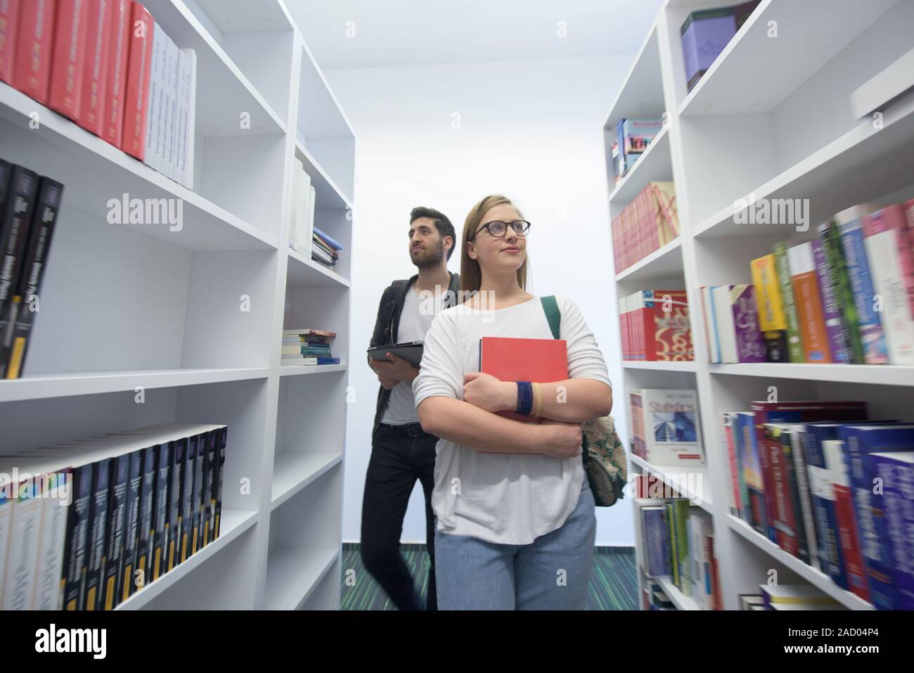 students group in school library Stock Photo - Alamy