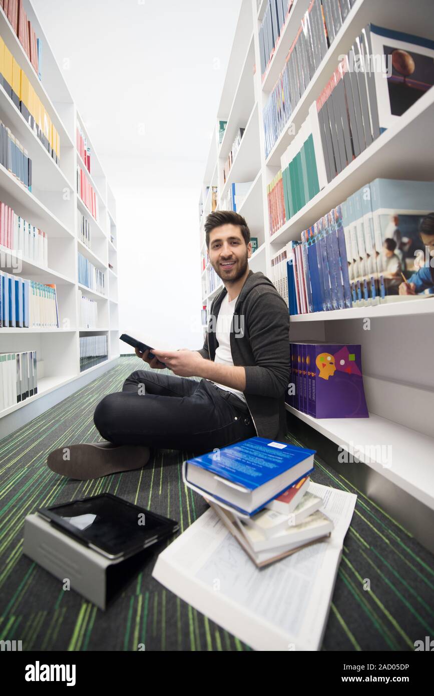 student study in school library Stock Photo - Alamy