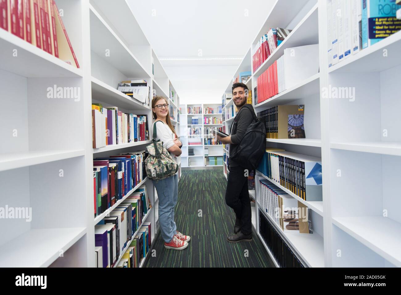 students group in school library Stock Photo - Alamy