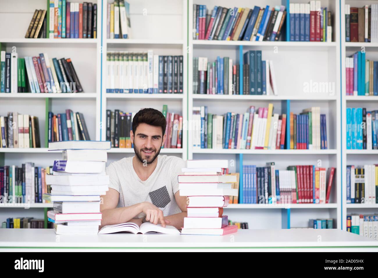 student study in school library Stock Photo - Alamy