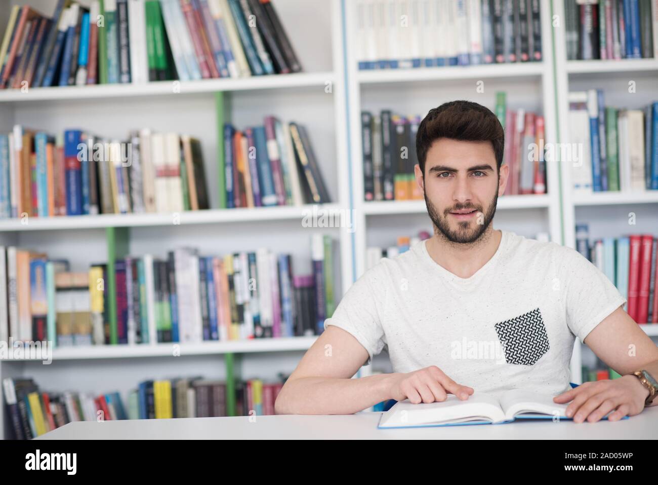 student study in school library Stock Photo - Alamy