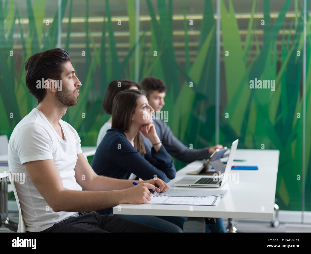 group of students study together in classroom Stock Photo - Alamy