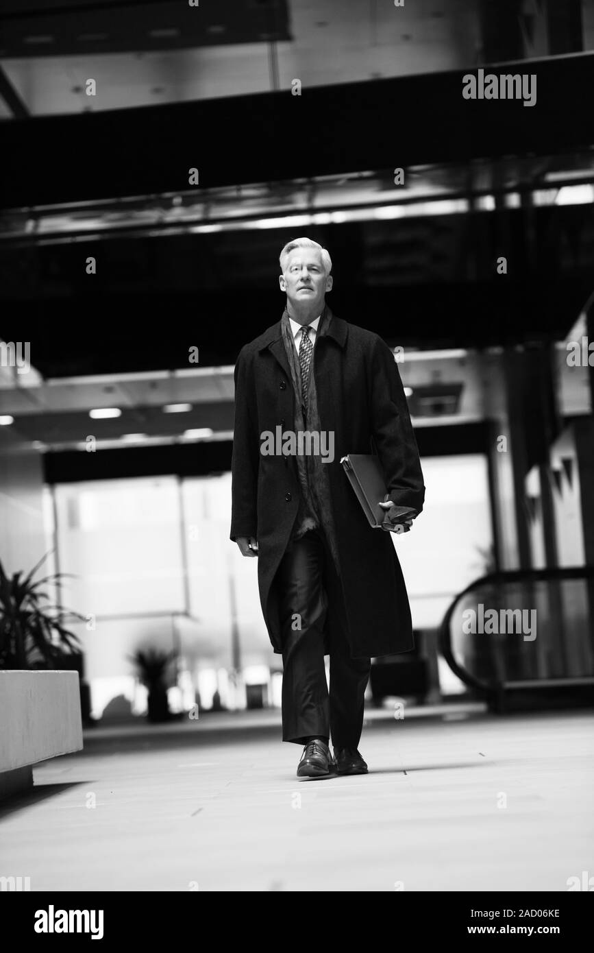 Happy old man walking smiling Black and White Stock Photos & Images - Alamy