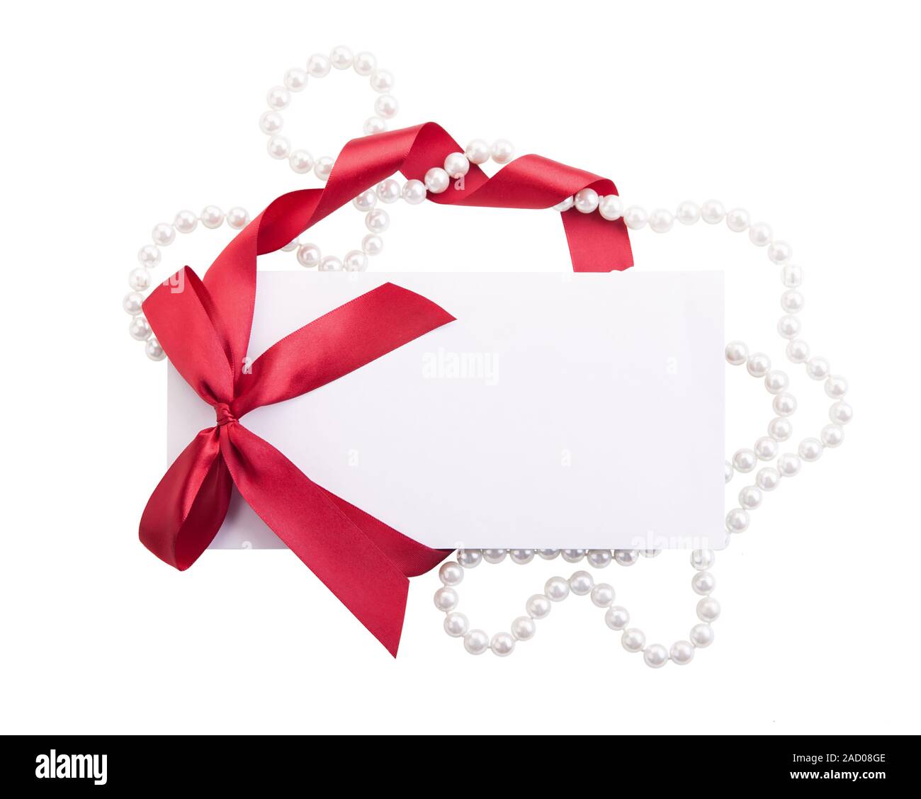 Card note with red ribbon on white background Stock Photo - Alamy