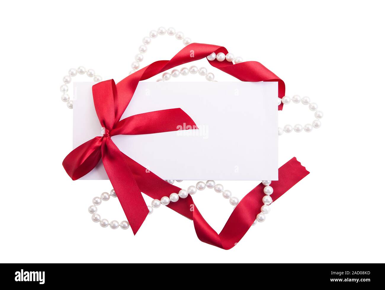 Card note with red ribbon on white background Stock Photo - Alamy