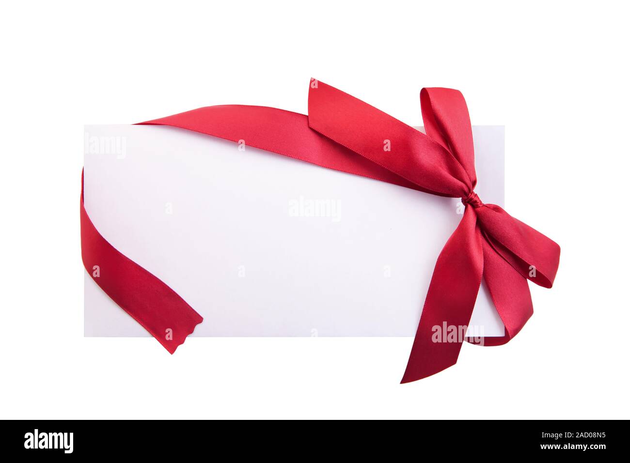 Card note with red ribbon on white background Stock Photo - Alamy