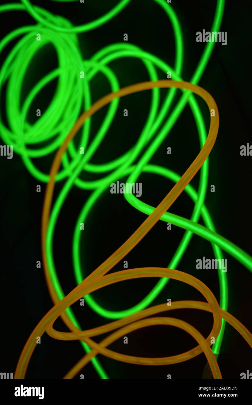 Bright luminous yellow and green, lime neon wires in different formats ...