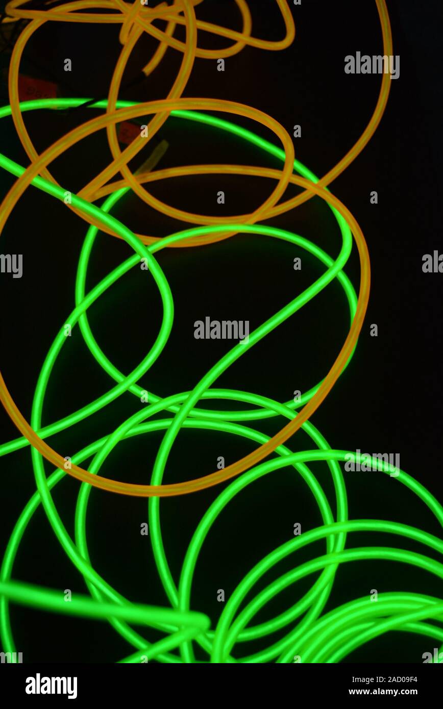 Bright luminous yellow and green, lime neon wires in different formats ...