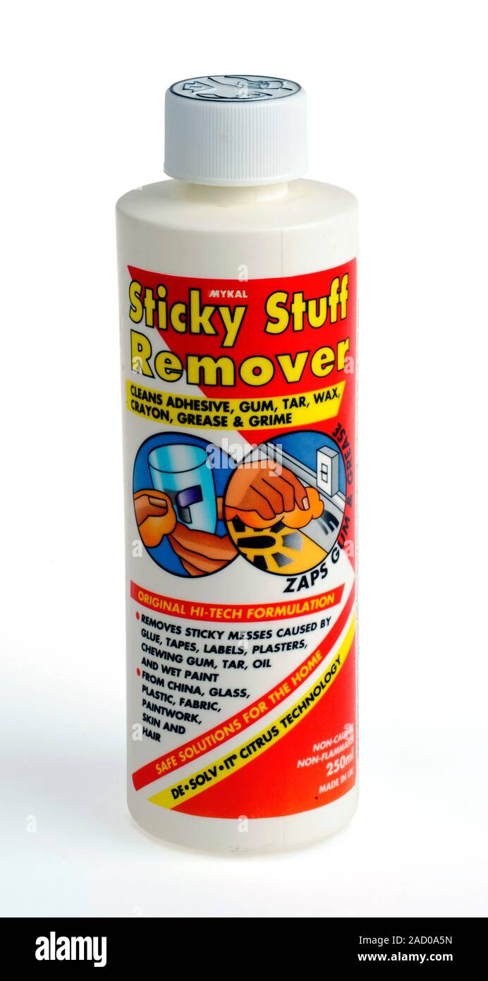 Sticky residue remover. Bottle containing a solvent-based fluid used to ...
