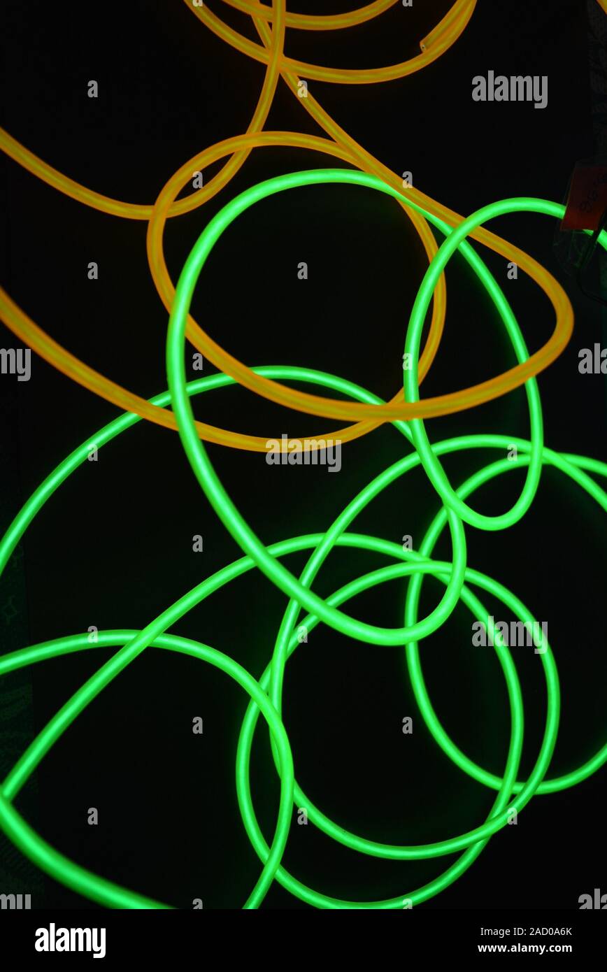 Bright luminous yellow and green, lime neon wires in different formats ...