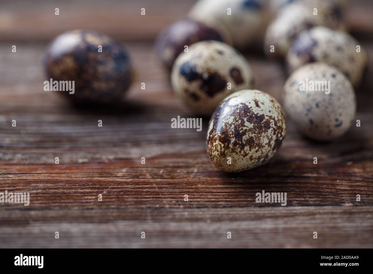 Group of quail eggs on thewooden background Stock Photo - Alamy
