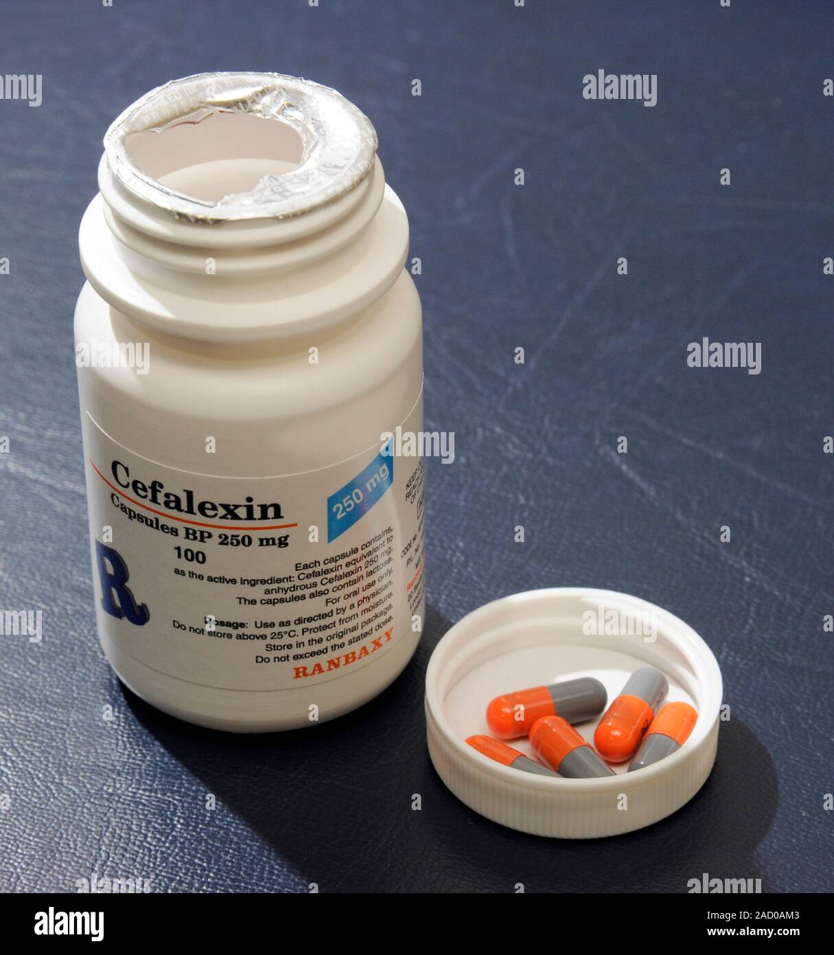 Cefalexin antibiotic drug. Tub containing capsules of the antibiotic ...