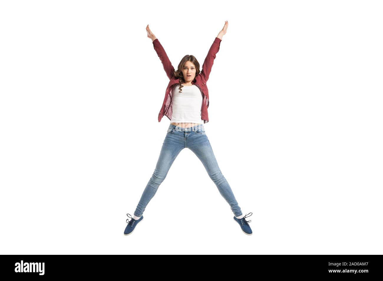 Young girl dancing over white background Stock Photo - Alamy
