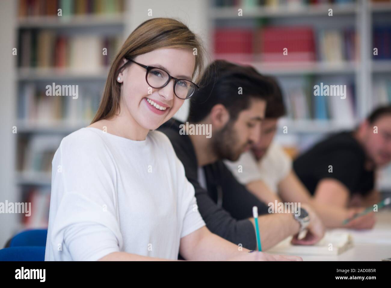 group of students study together in classroom Stock Photo - Alamy