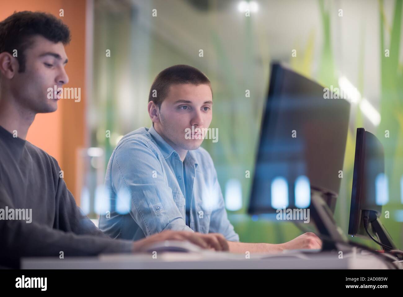 technology students group working in computer lab school classroom ...