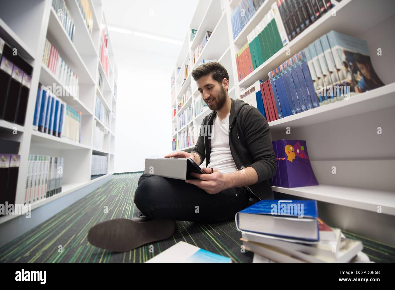 student study in school library Stock Photo - Alamy
