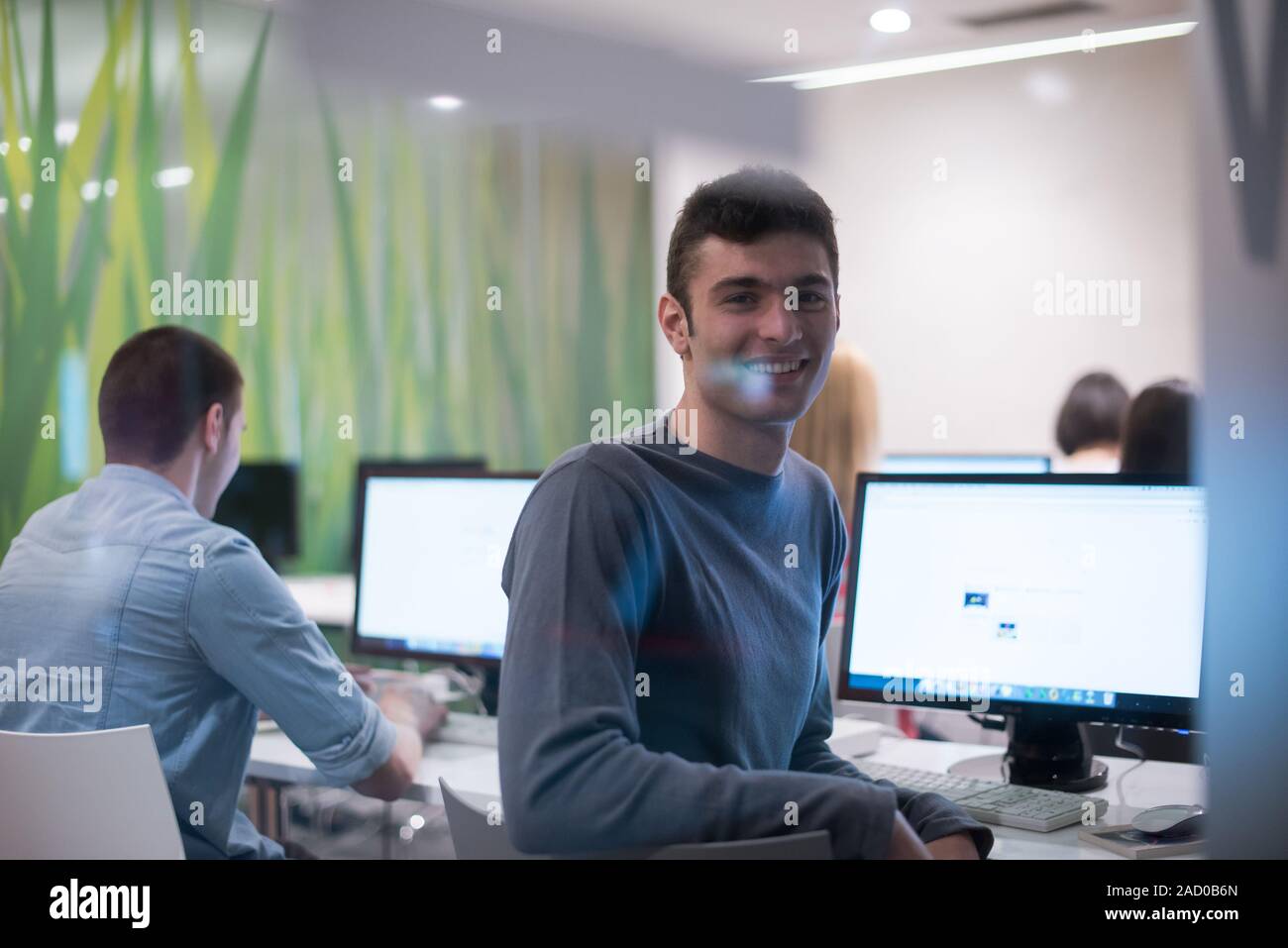 technology students group working in computer lab school classroom ...