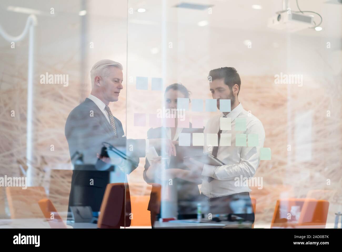 young creative Business people with senior ceo Stock Photo - Alamy