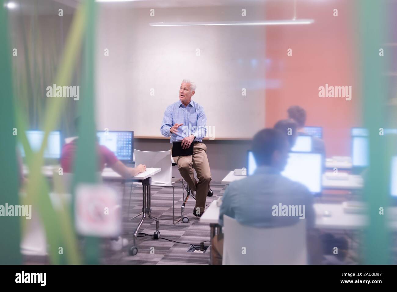 teacher and students in computer lab classroom Stock Photo - Alamy