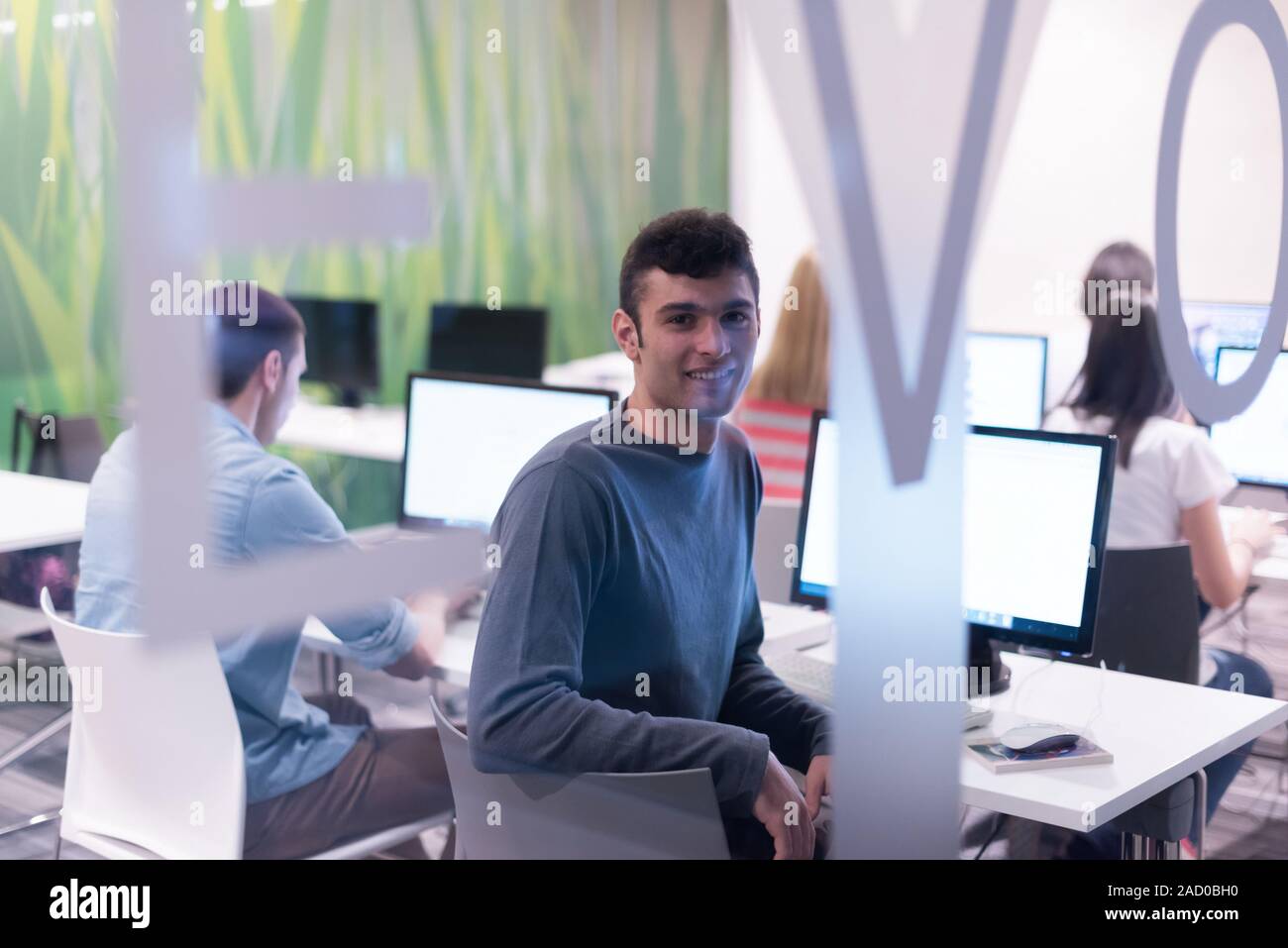 technology students group working in computer lab school classroom ...