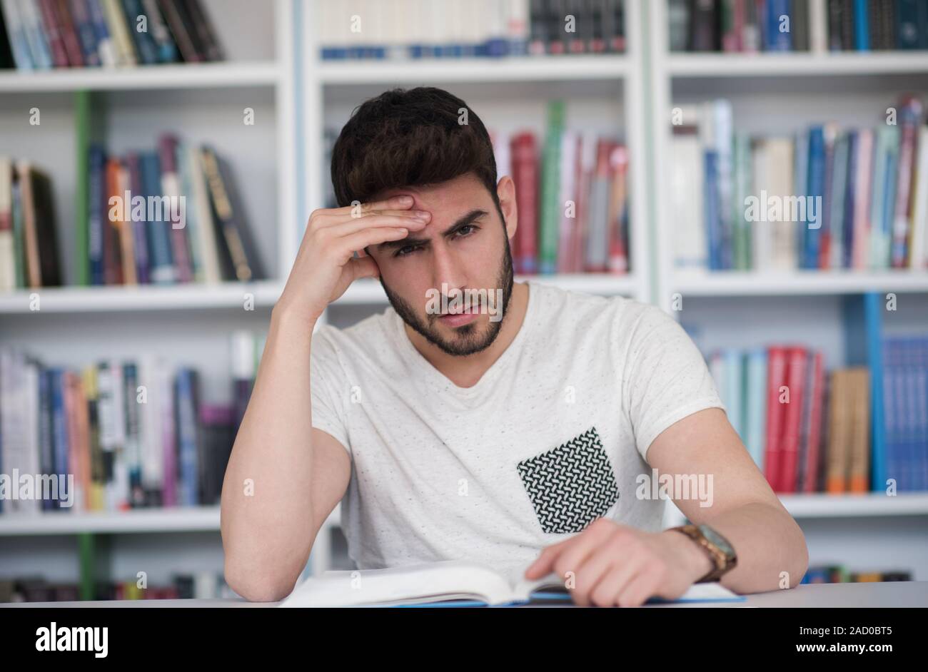 student study in school library Stock Photo - Alamy