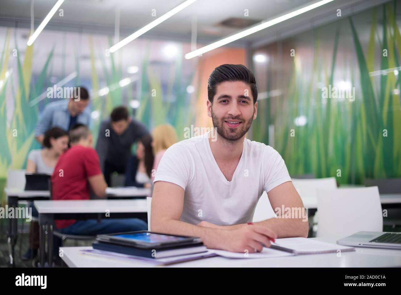 male student in classroom Stock Photo - Alamy