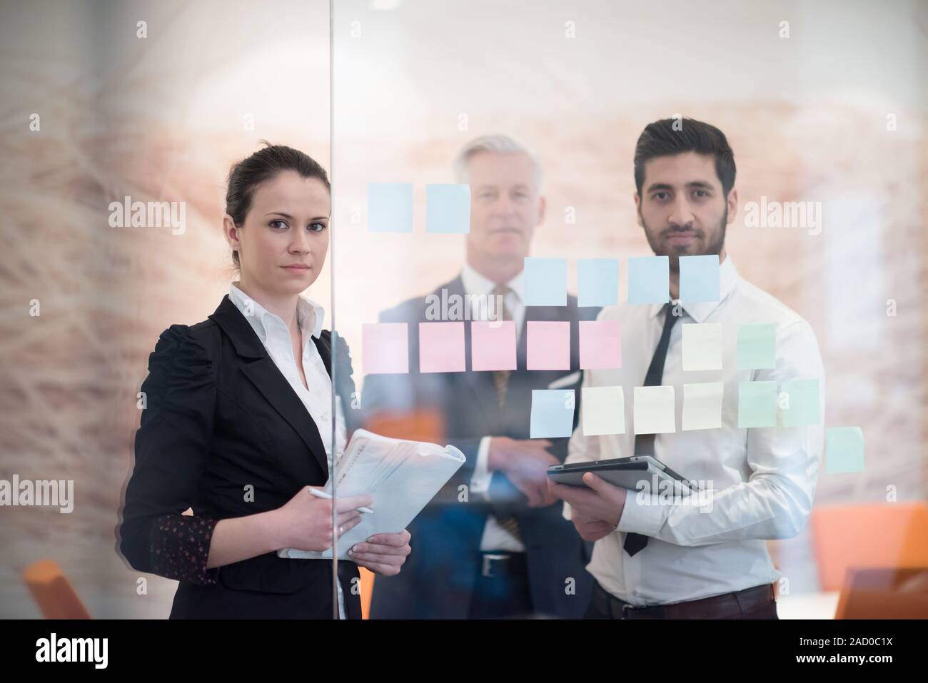 young creative Business people with senior ceo Stock Photo - Alamy