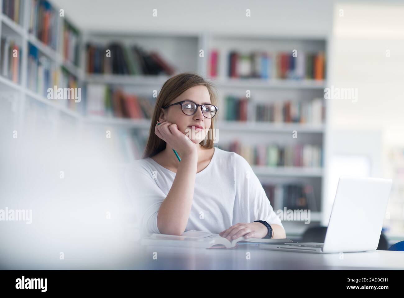 student study in library Stock Photo - Alamy
