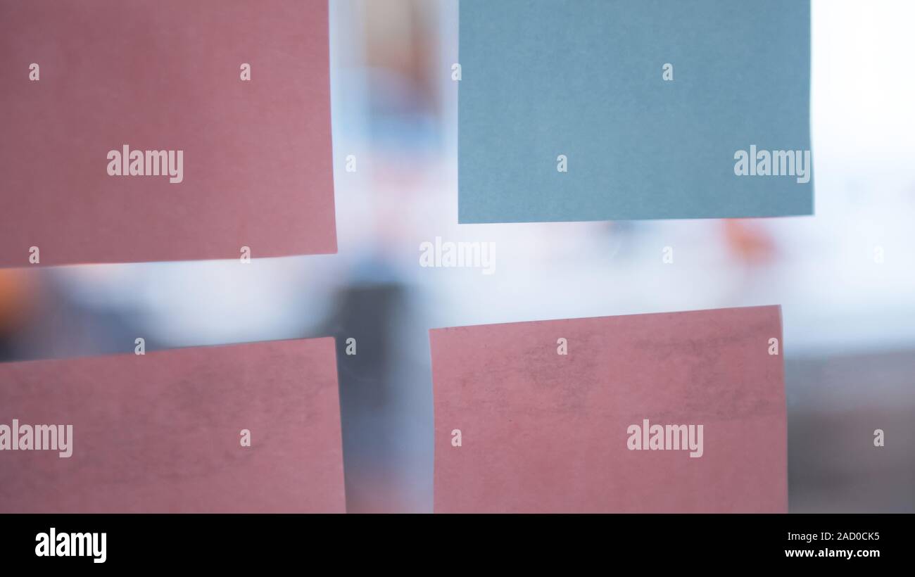 memo stickers on office wall Stock Photo - Alamy