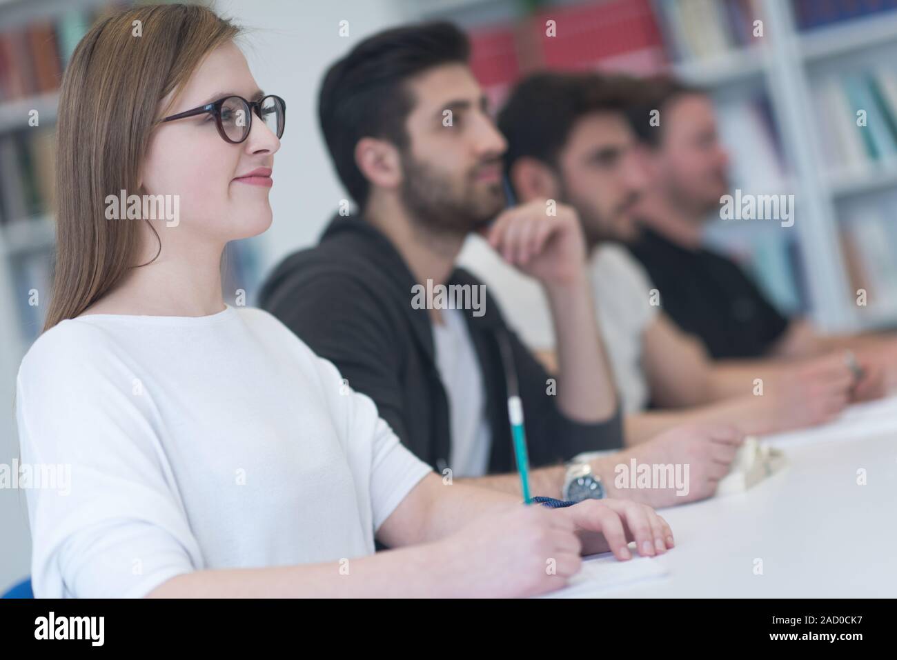 group of students study together in classroom Stock Photo - Alamy