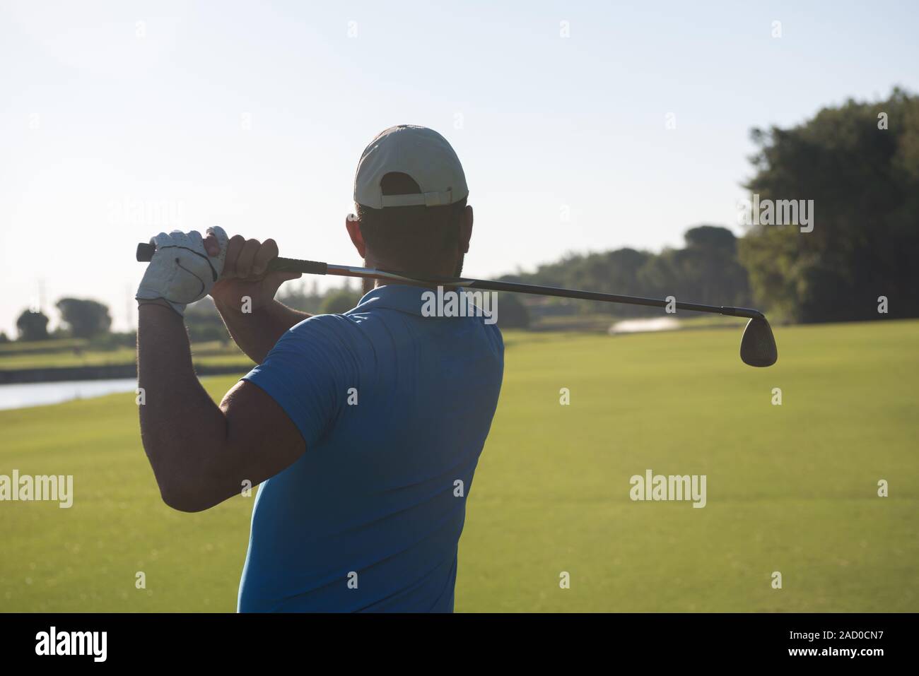 golf player hitting shot Stock Photo - Alamy