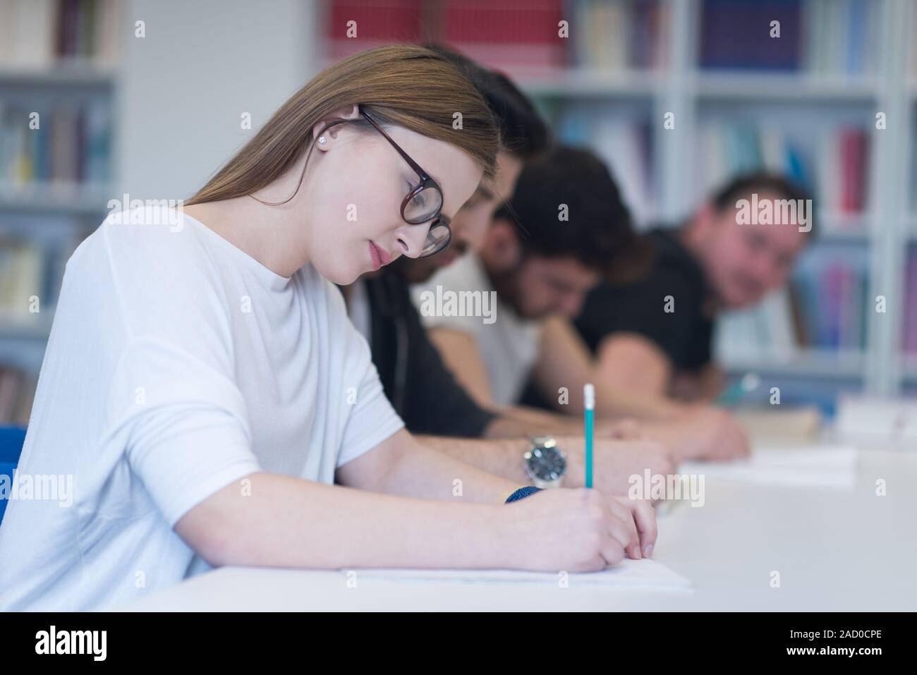 group of students study together in classroom Stock Photo - Alamy