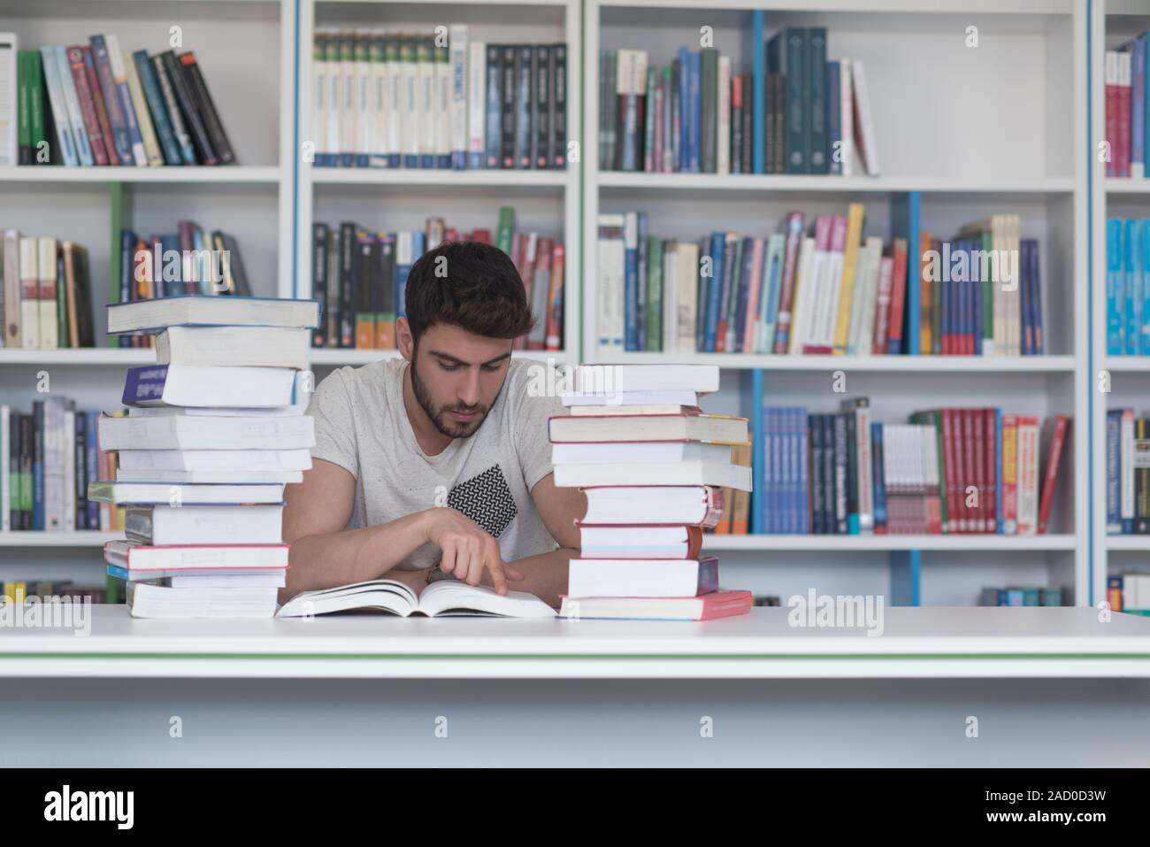 student study in school library Stock Photo - Alamy